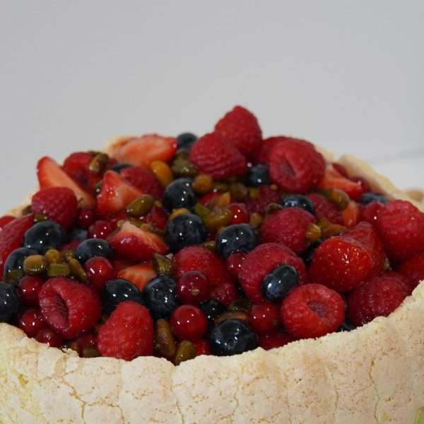 La recette de la Charlotte pistache fruits rouge - Défis Pâtisserie